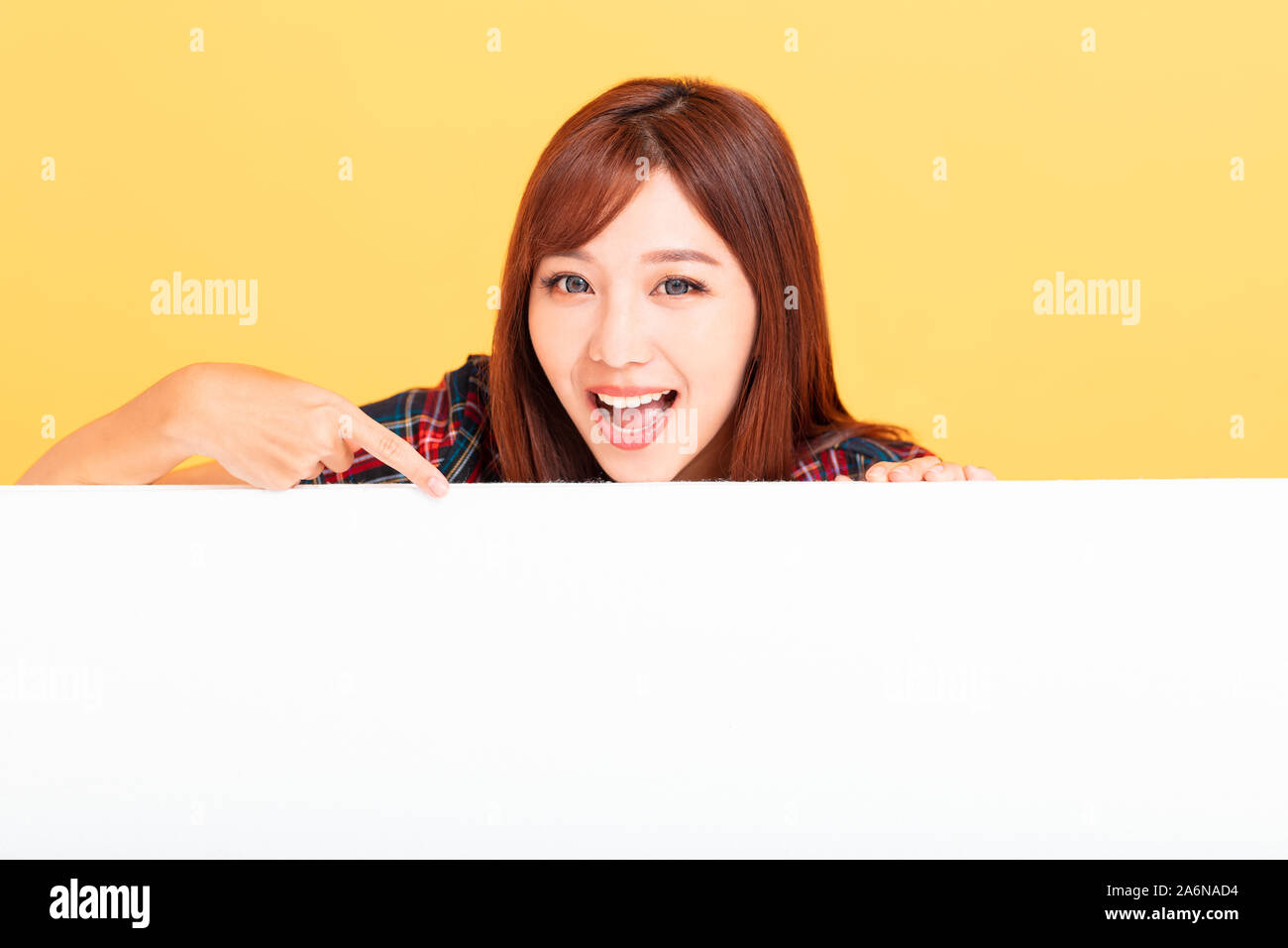 Young Asian woman holding blank billboard for advertising signs Stock ...