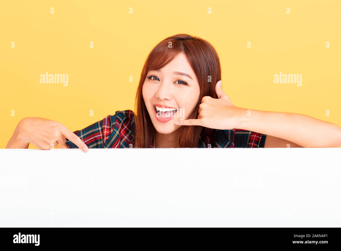 Young Asian woman holding blank billboard for advertising signs Stock ...