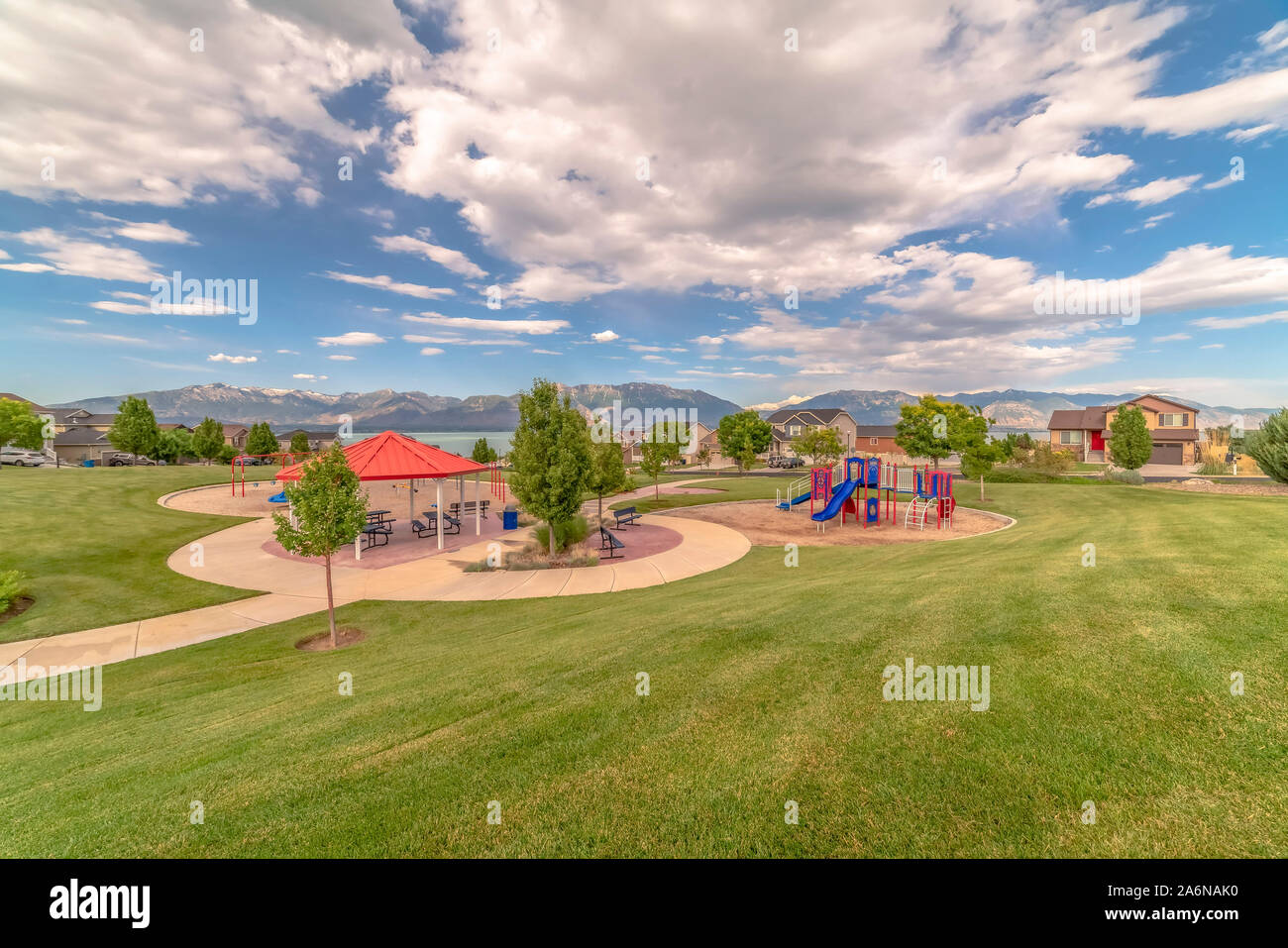 Stunning view of Mount Timpanogos towering over a lake and the valley ...