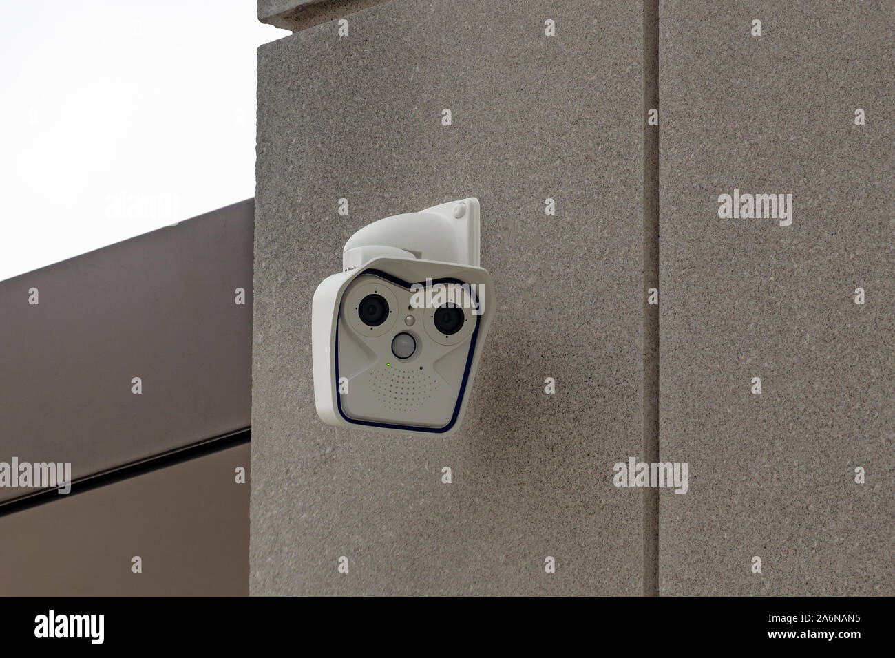 Electric camera on house facade in Detail Stock Photo - Alamy