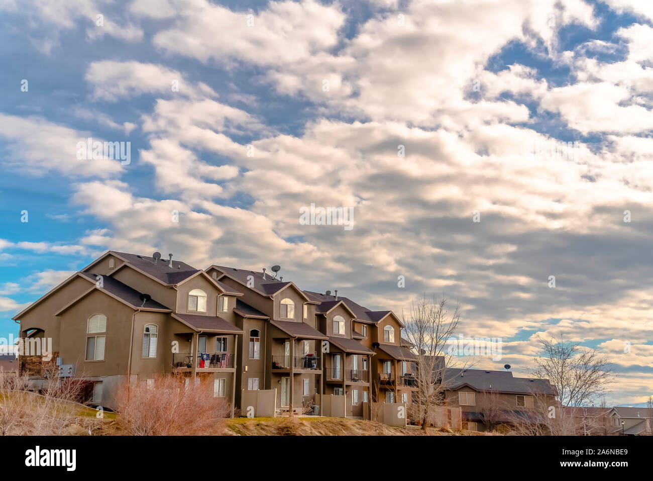 Development of cluster houses on a mountain ridge Stock Photo - Alamy