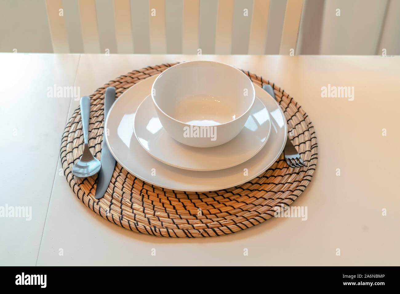 Modern dinner setting with cutlery and crockery Stock Photo - Alamy