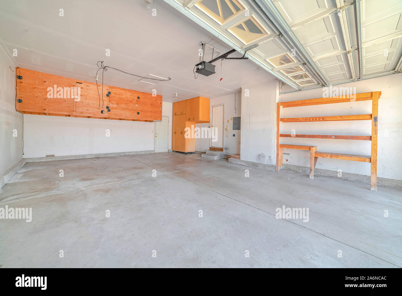 Interior of an empty, modern double garage Stock Photo - Alamy