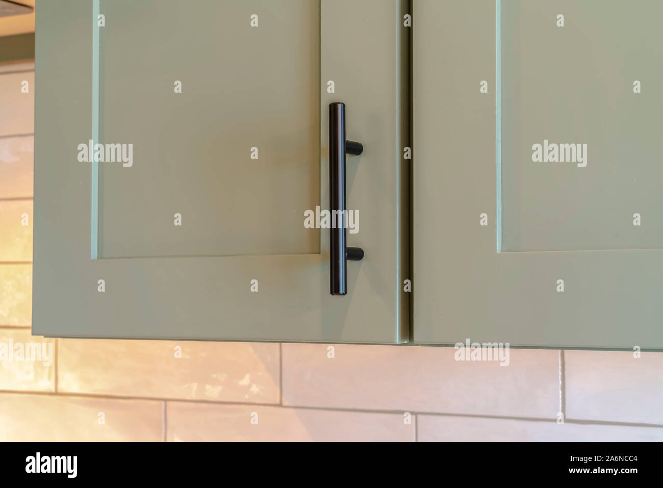Close up of kitchen cupboard missing a handle Stock Photo - Alamy
