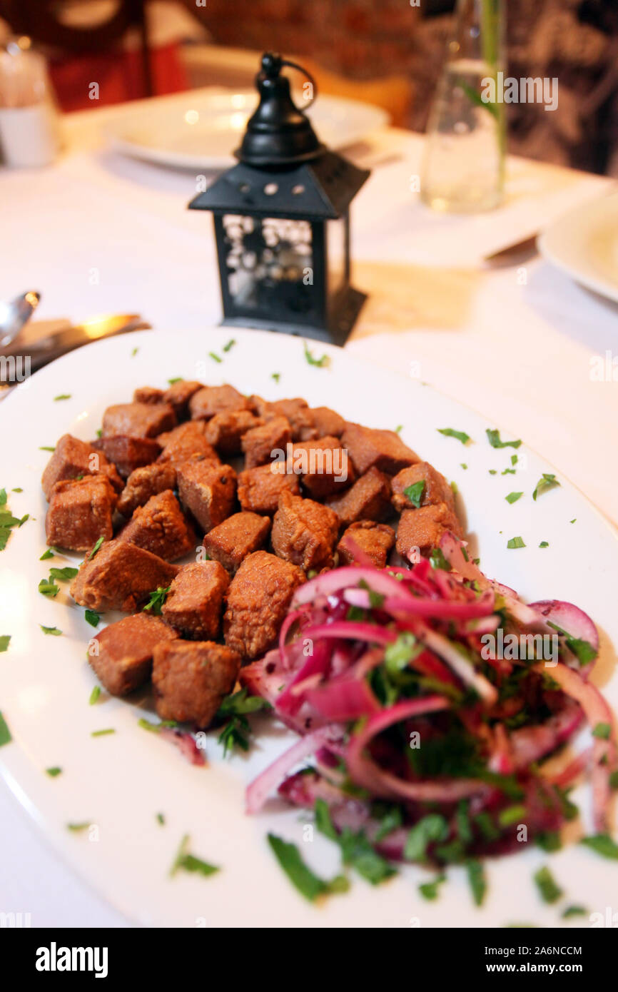 Turkish liver kebab (Ciger Kebab) on the dinner plate Stock Photo - Alamy