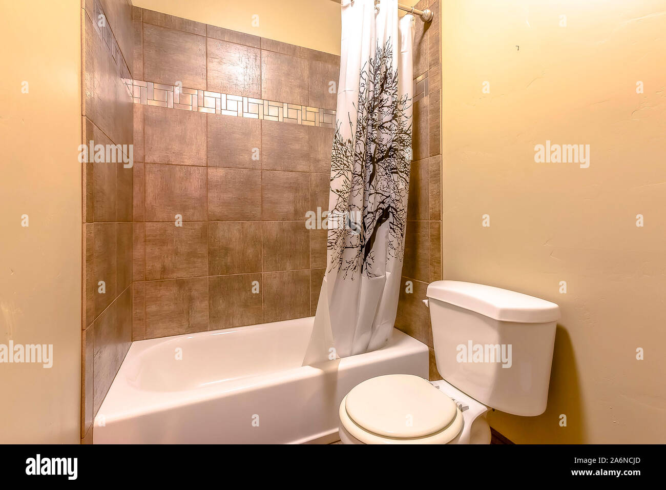 Interior of a small compact bathroom with curtain Stock Photo - Alamy