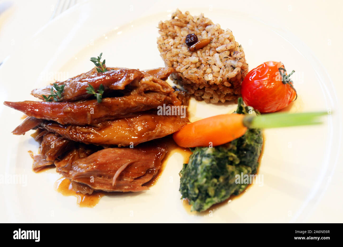 Lamp meat with vegetables and rice on the dinner plate Stock Photo - Alamy