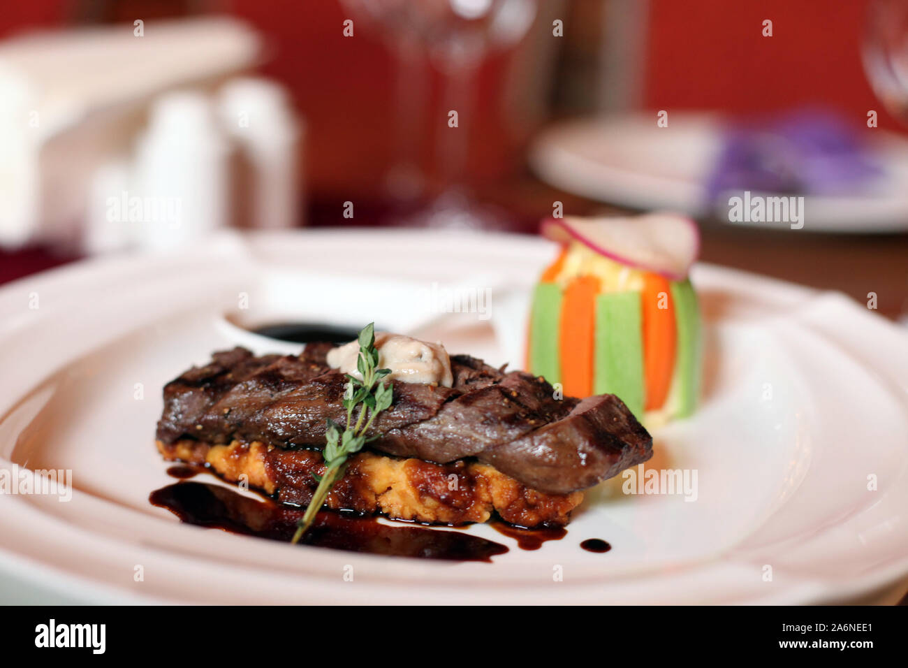 Beef with bread and vegetables on the dinner plate Stock Photo - Alamy