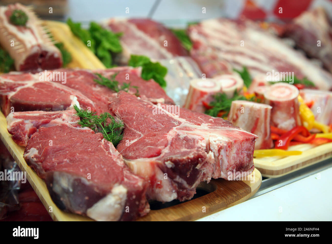 Raw meat on the butcher table Stock Photo - Alamy