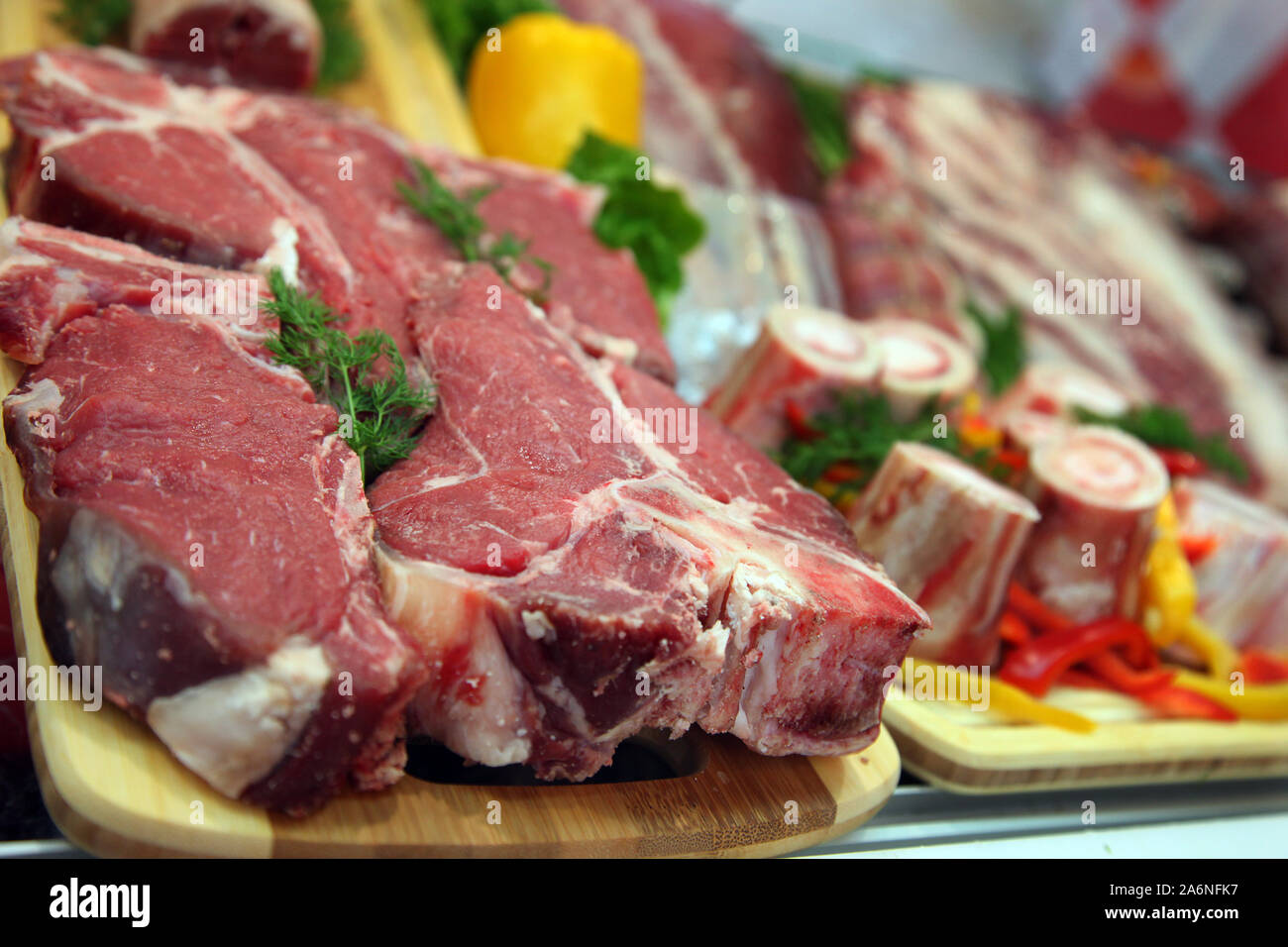 Raw meat on the butcher table Stock Photo - Alamy