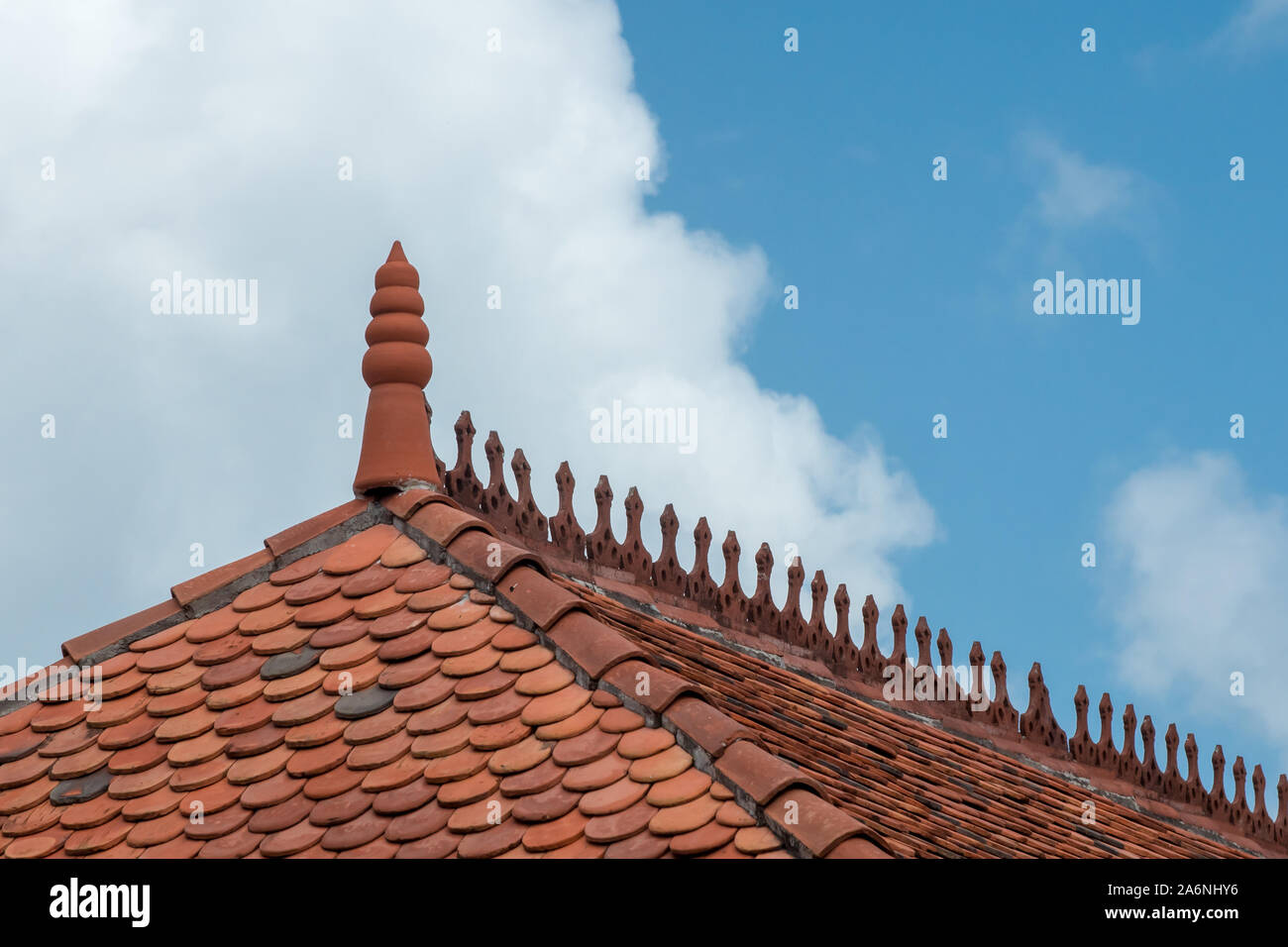 Traditional roof tiles with blue sky Stock Photo - Alamy