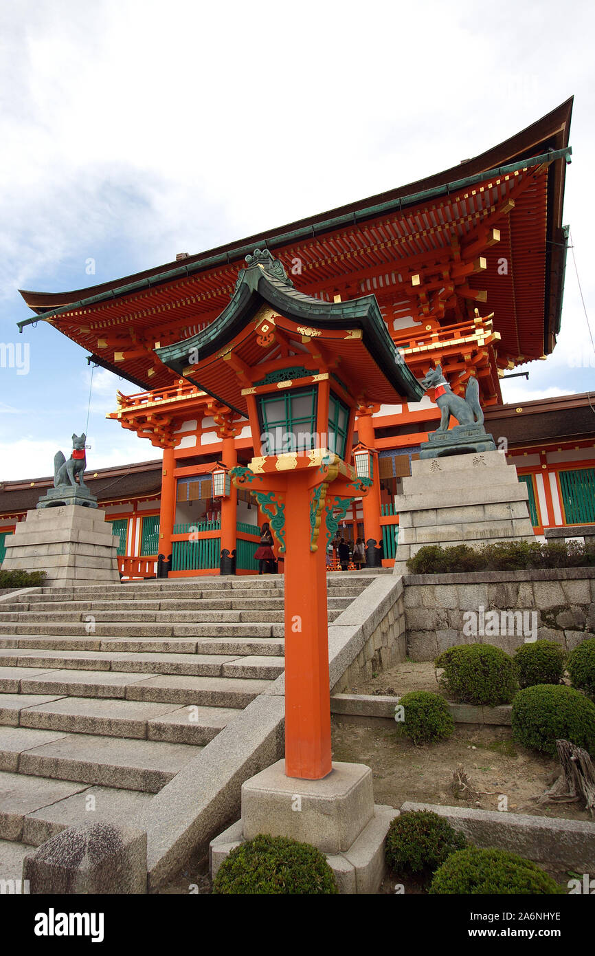 Ornate lamp in front of the Two-Storeyed Gate at Fushimi Inari Taisha ...