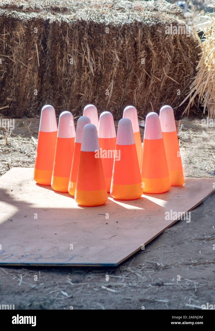 Fun bowling pins are painted to look like candy corn, at a Halloween ...