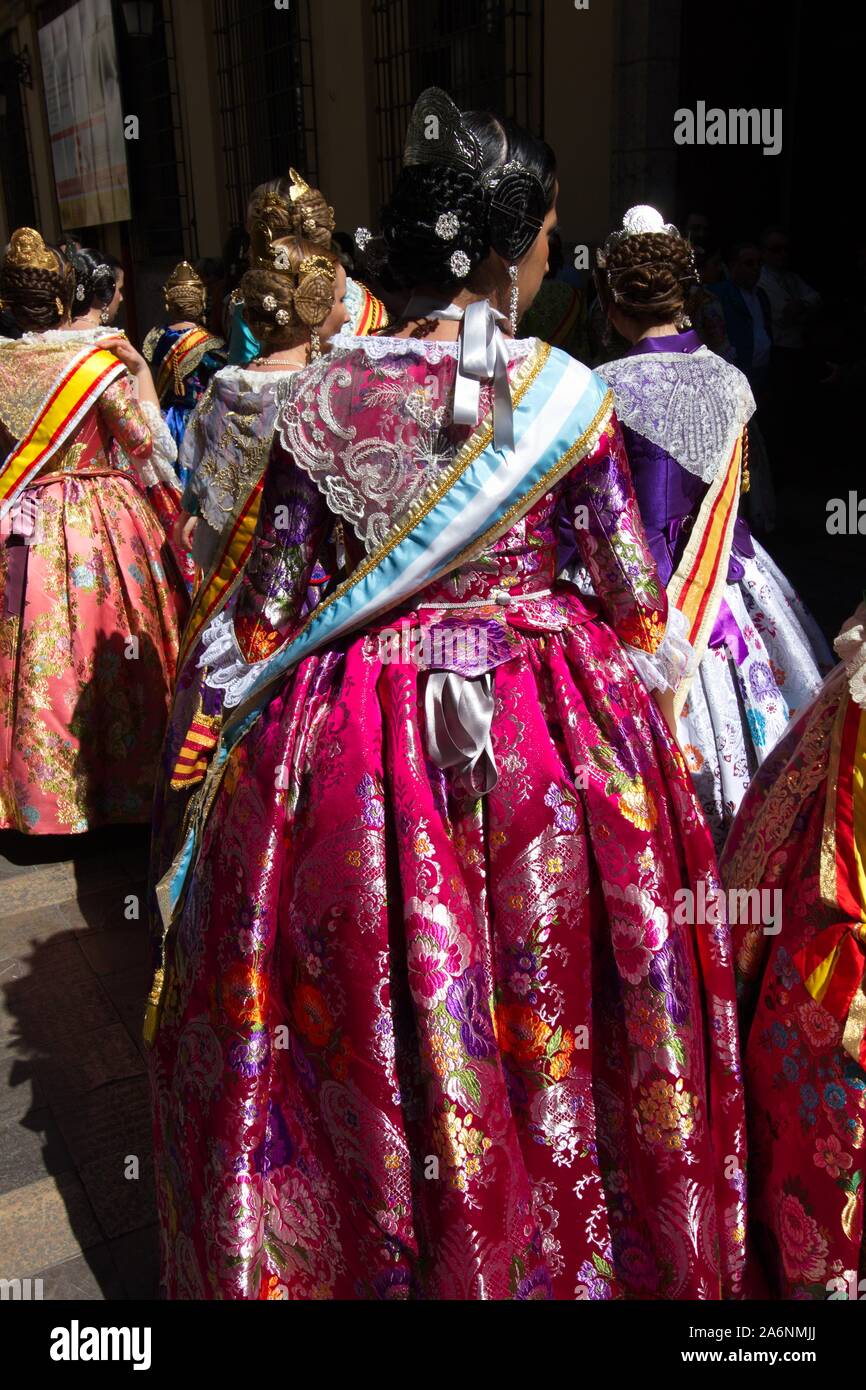 Women in gorgeous traditional dress at Las Fallas festival in Valencia ...