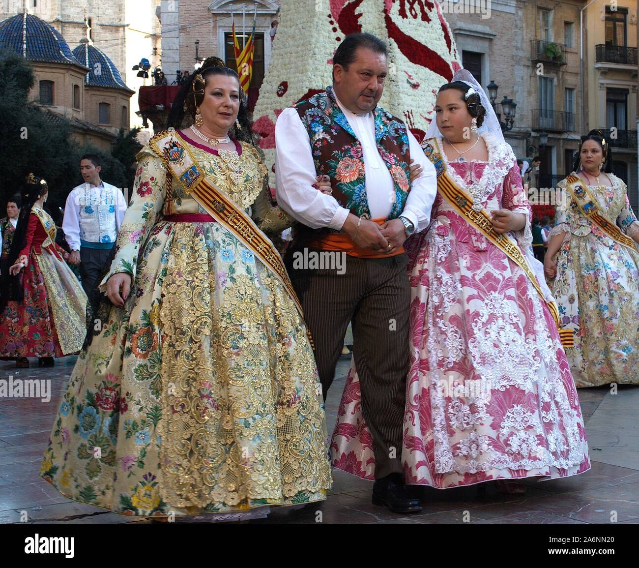 A family group in the traditional dress parade at Las Fallas festival ...