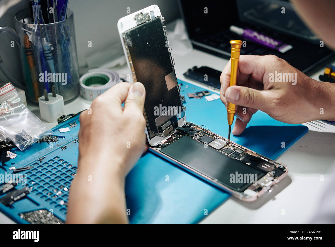 Removing sim hi-res stock photography and images - Alamy
