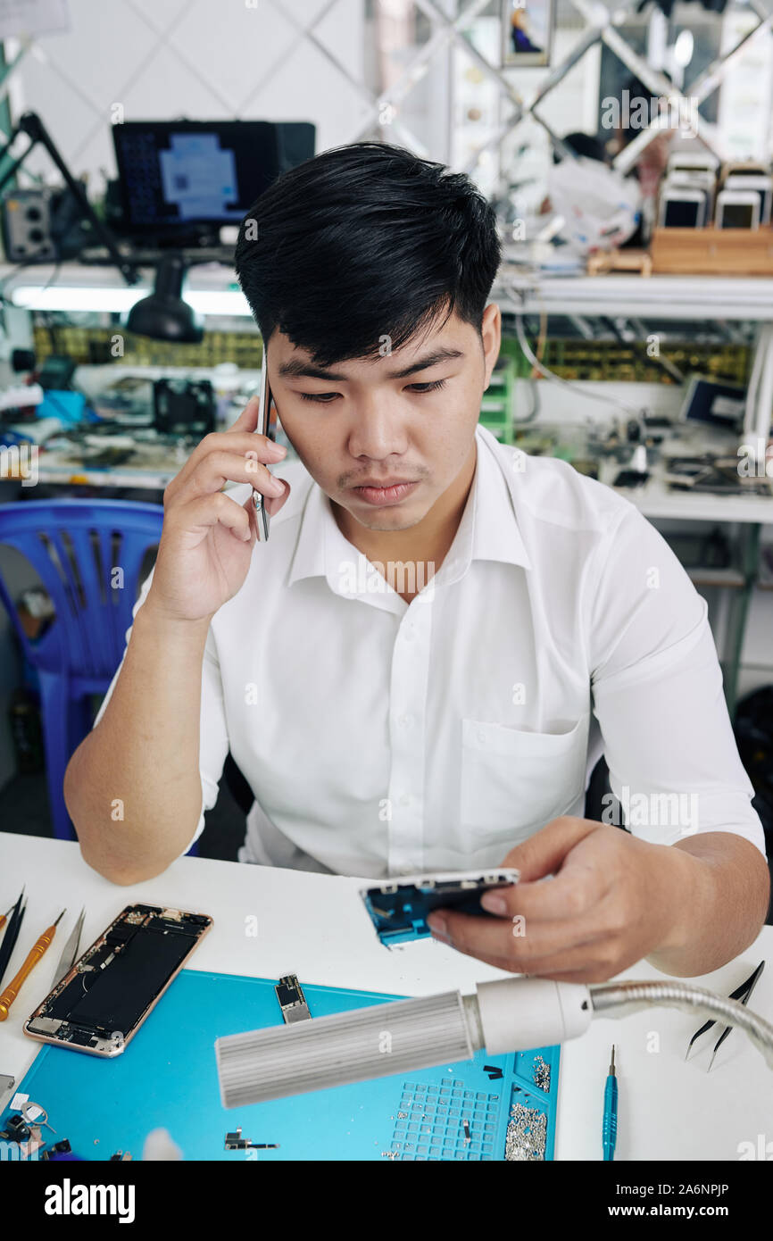 Fixing problems hi-res stock photography and images - Alamy