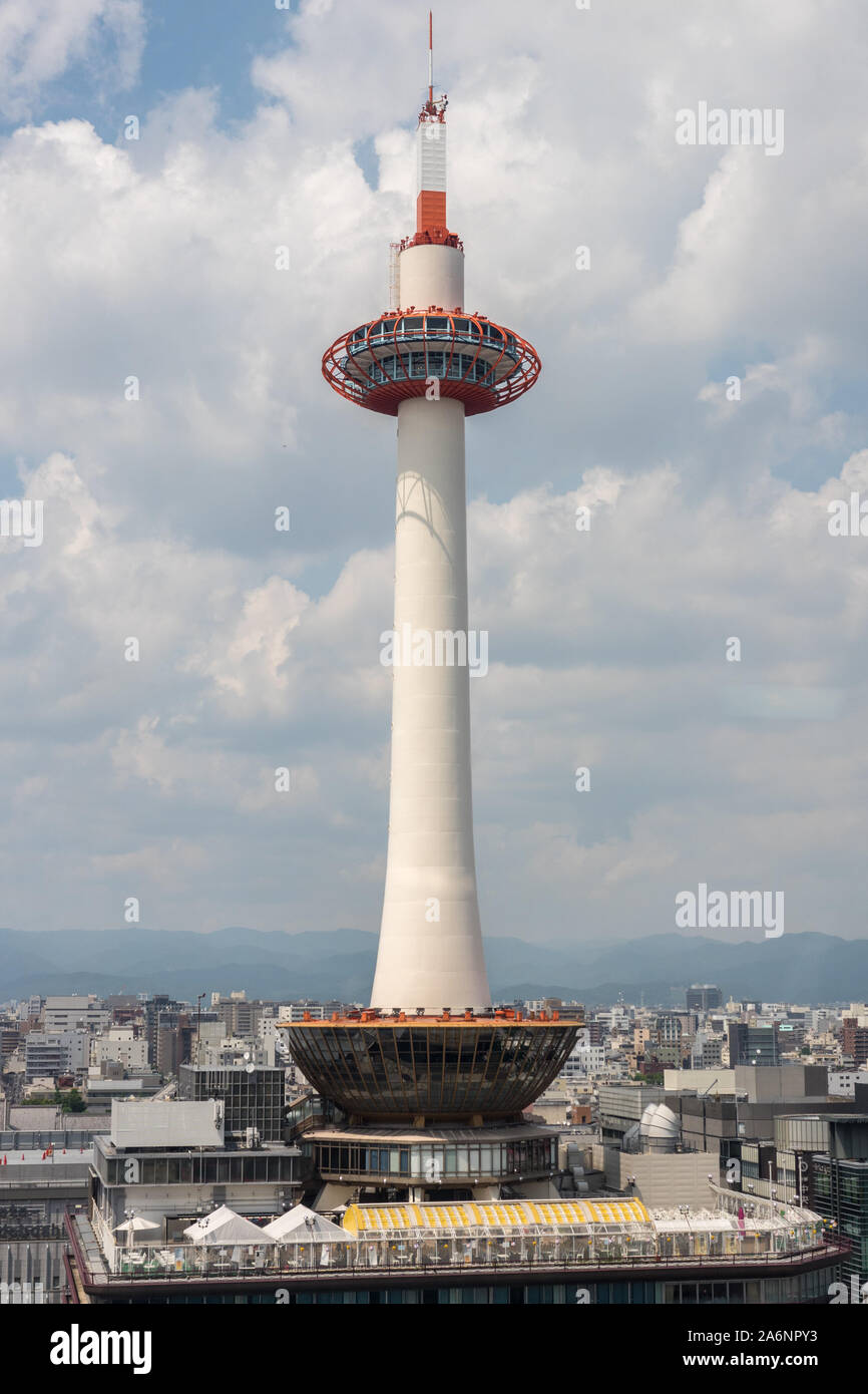 Kyoto Tower with blue sky with clouds, it's an observation tower ...