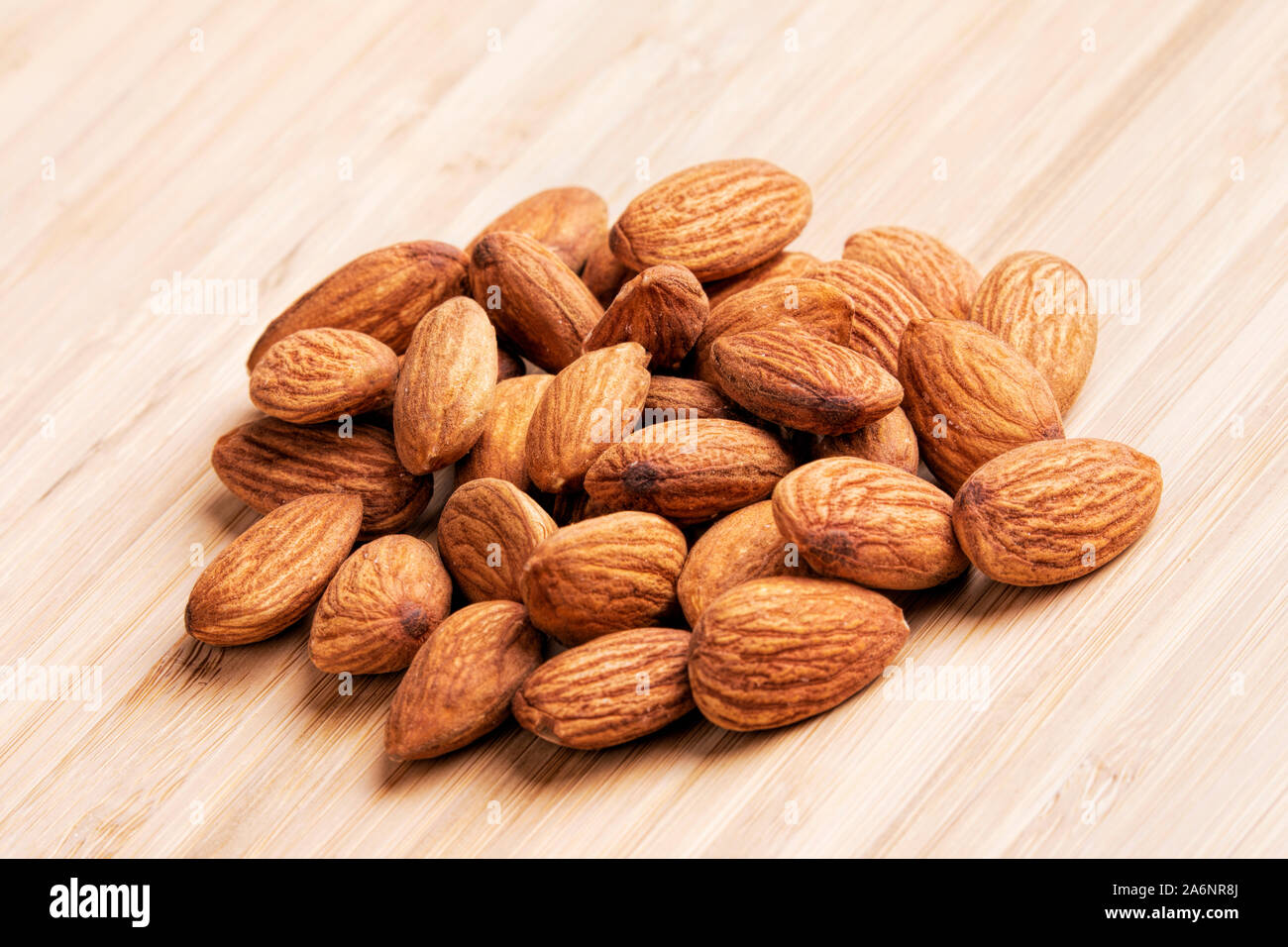 Almonds make a great comfort food and snack food Stock Photo - Alamy