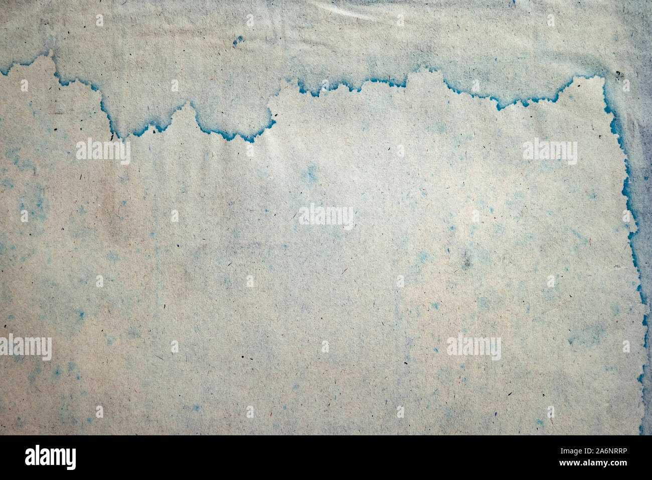 old blue paper with water stains Stock Photo - Alamy