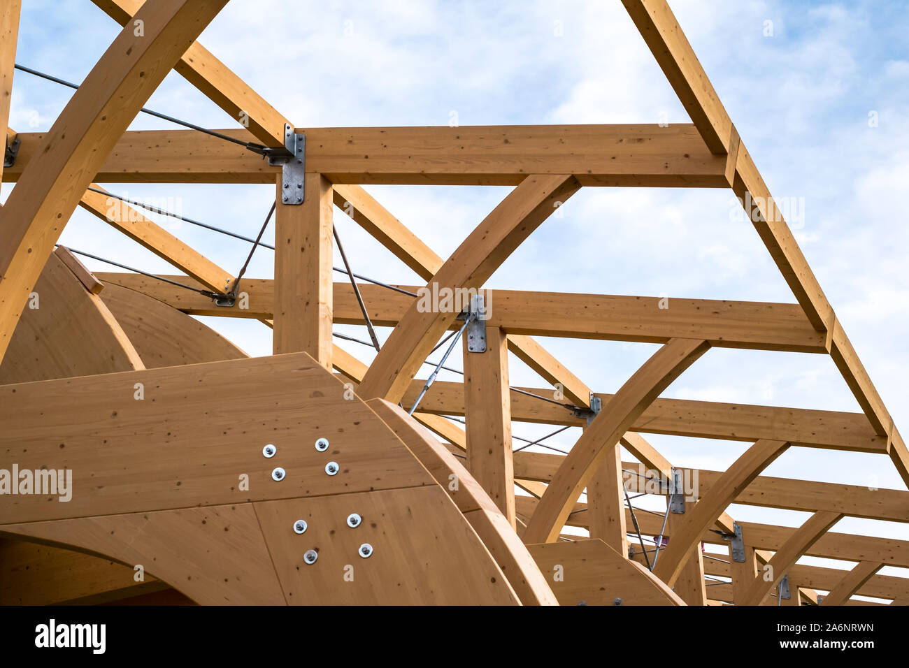 Detail of a modern wooden architecture in glued laminated timber on a ...