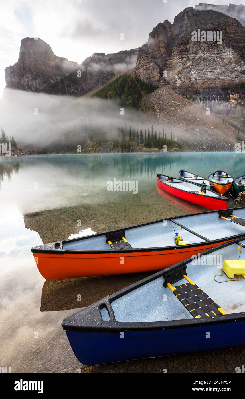 Canoe on the lake in Canadian Rocky Stock Photo - Alamy