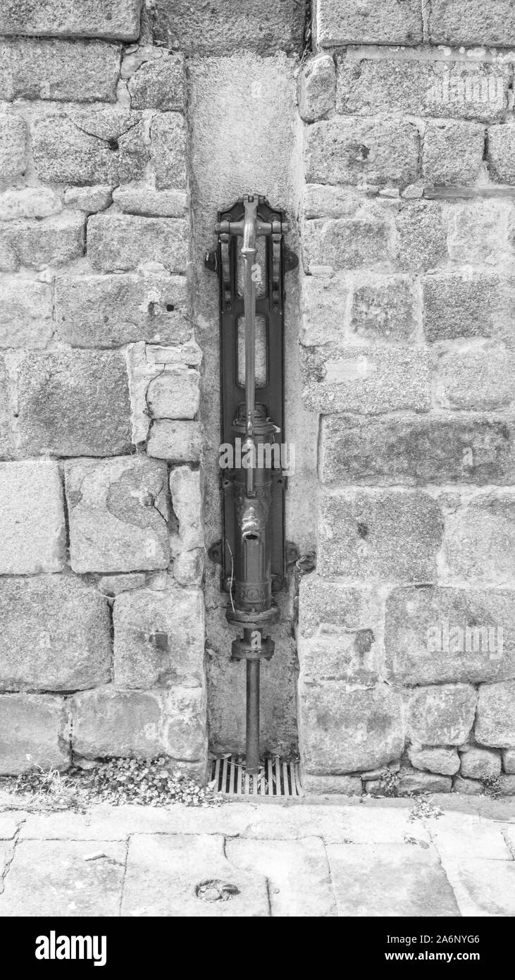 black and white picture of Old water manual french pump Stock Photo - Alamy