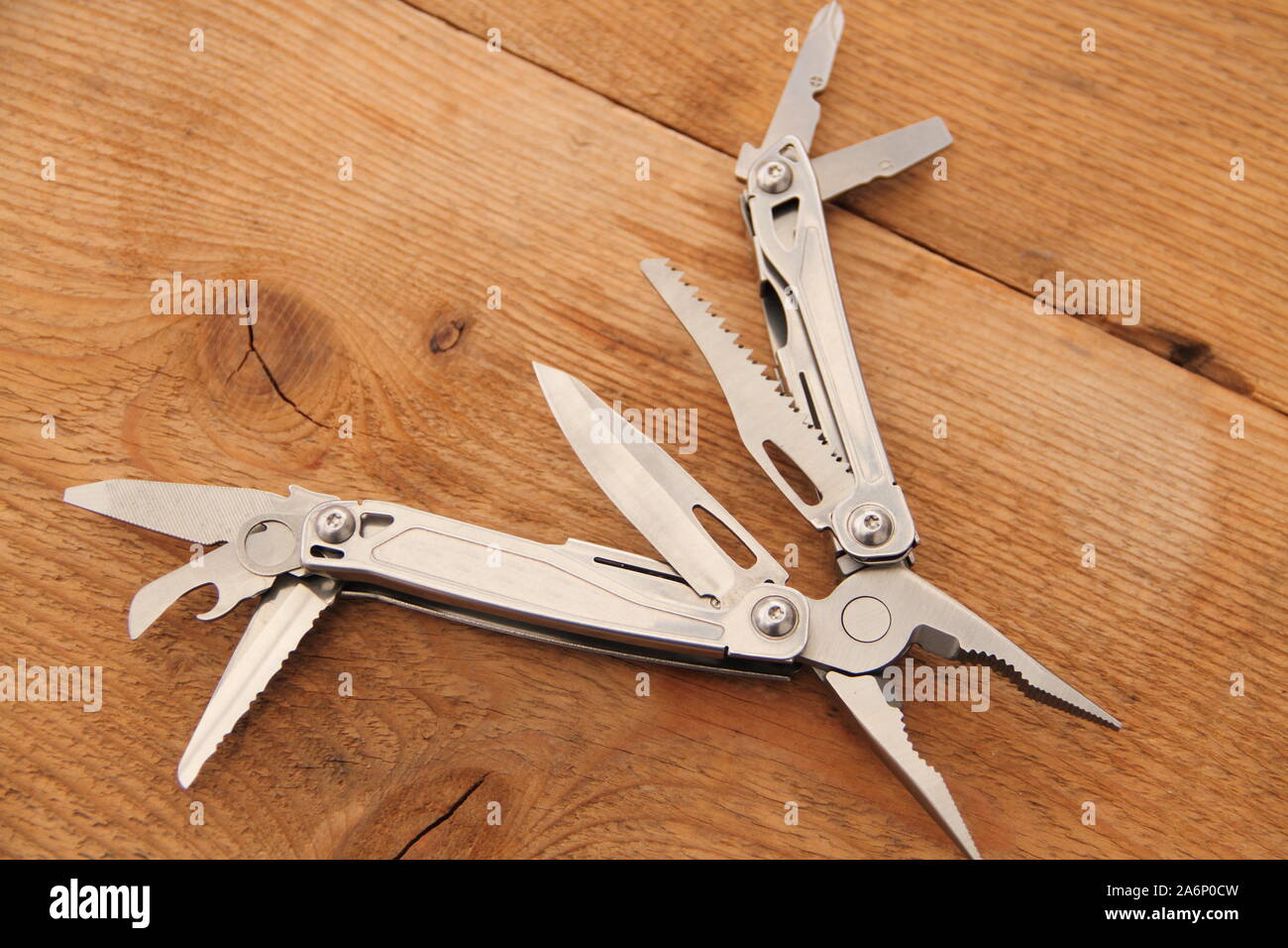 a multitool on the workbench Stock Photo - Alamy