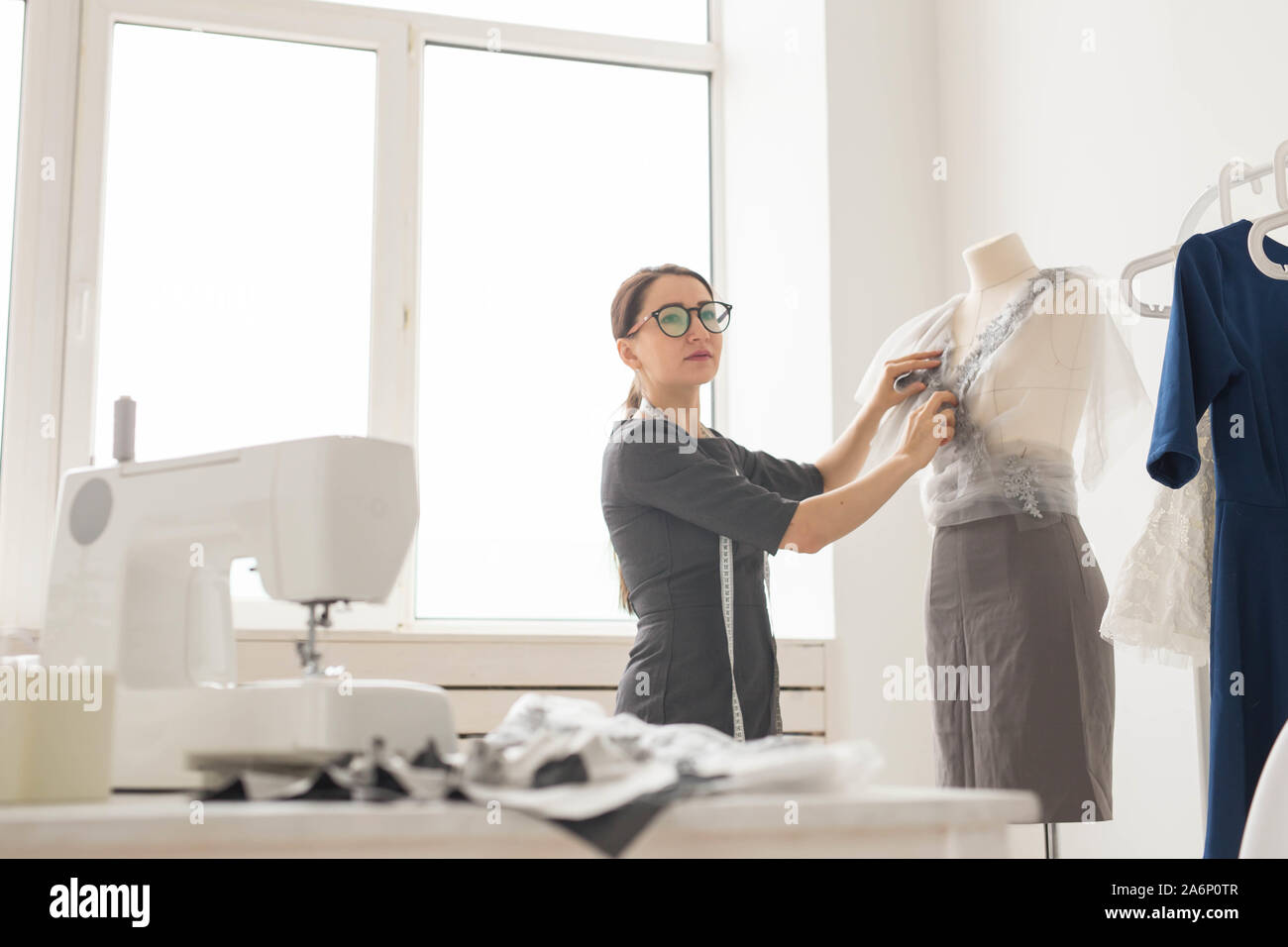 Dressmaker, tailor, fashion and showroom concept - Portrait of talented ...