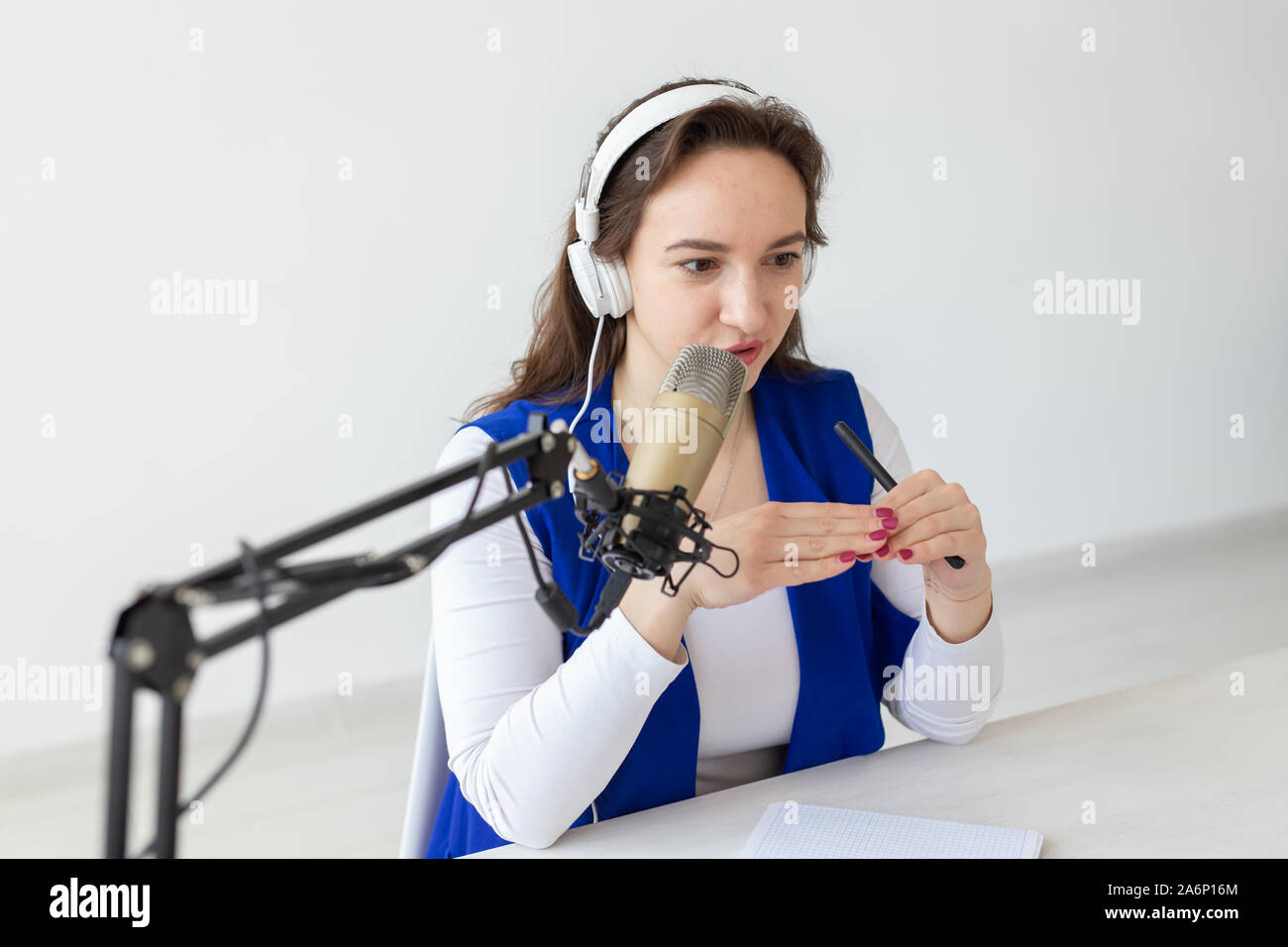 radio, work, people concept - woman dj is working on the radio Stock ...