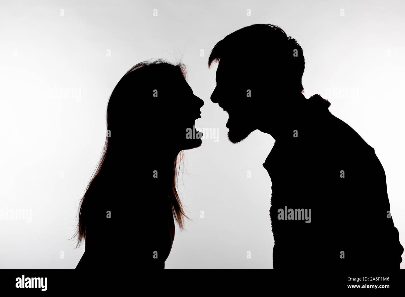 Aggression and abuse concept - man and woman expressing domestic ...
