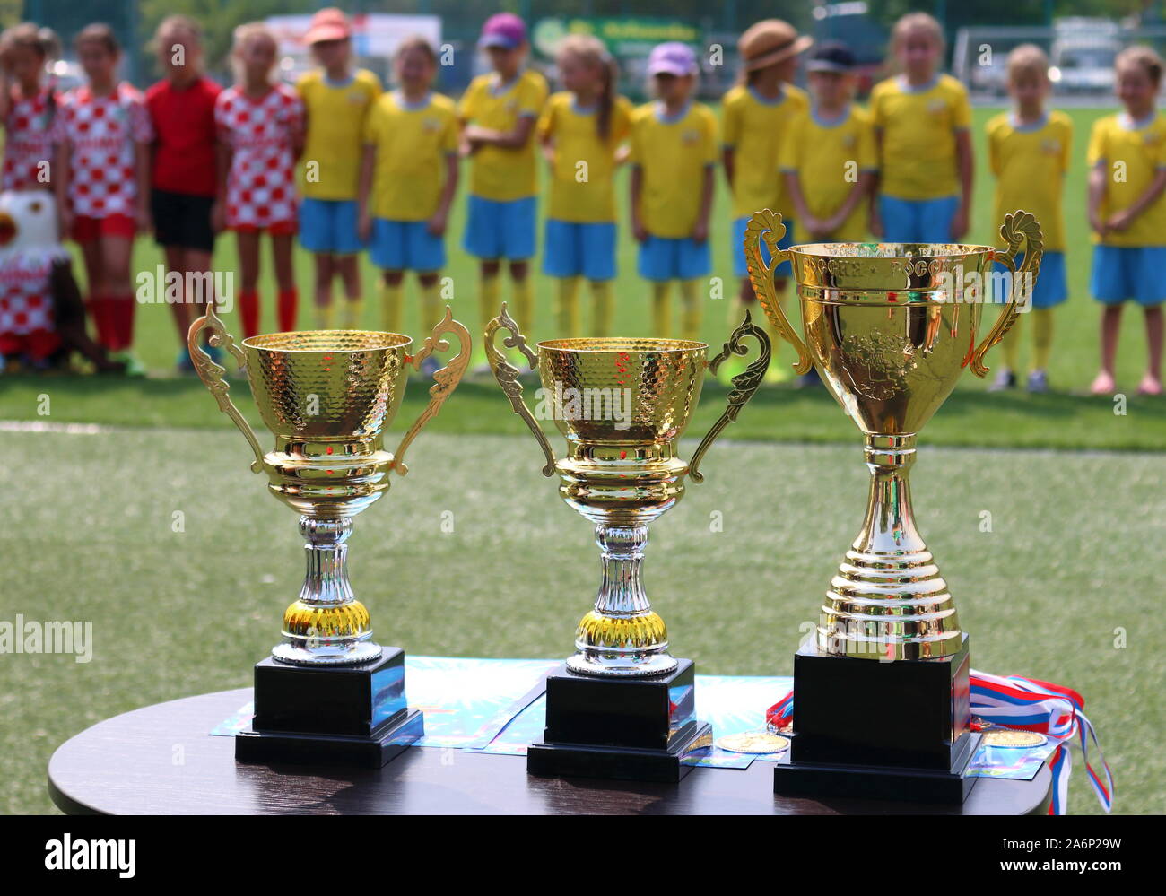 Awarding cups and medals of football teams Stock Photo - Alamy