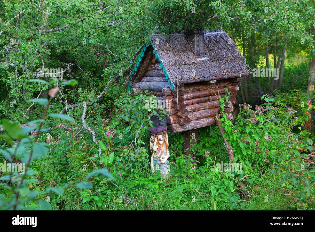 Decorative hut in the forest near the pond Stock Photo - Alamy