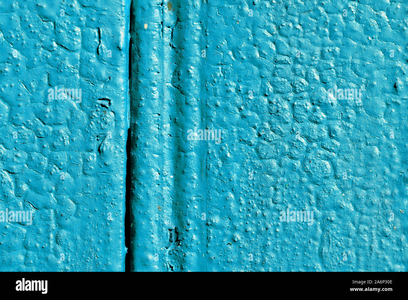 Blue color old painted wooden wall lit by sun close-up. Abstract ...