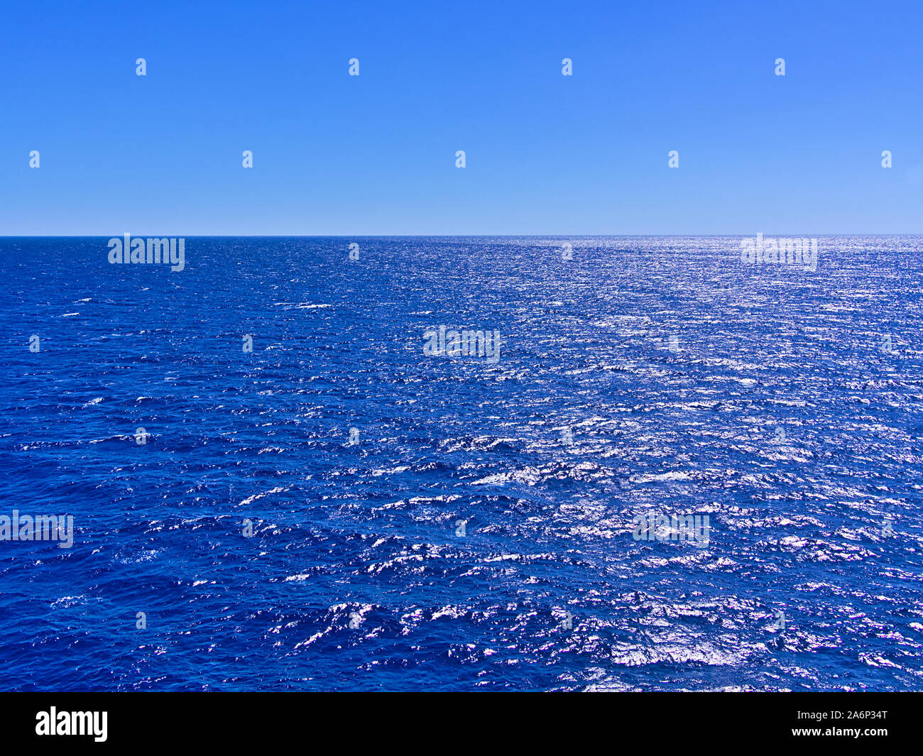 Vivid blue sea and sky with copy space, sunny summer day Stock Photo ...