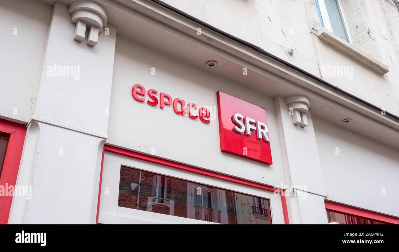 front view of french phone operator : SFR store Granville, France 2019 ...