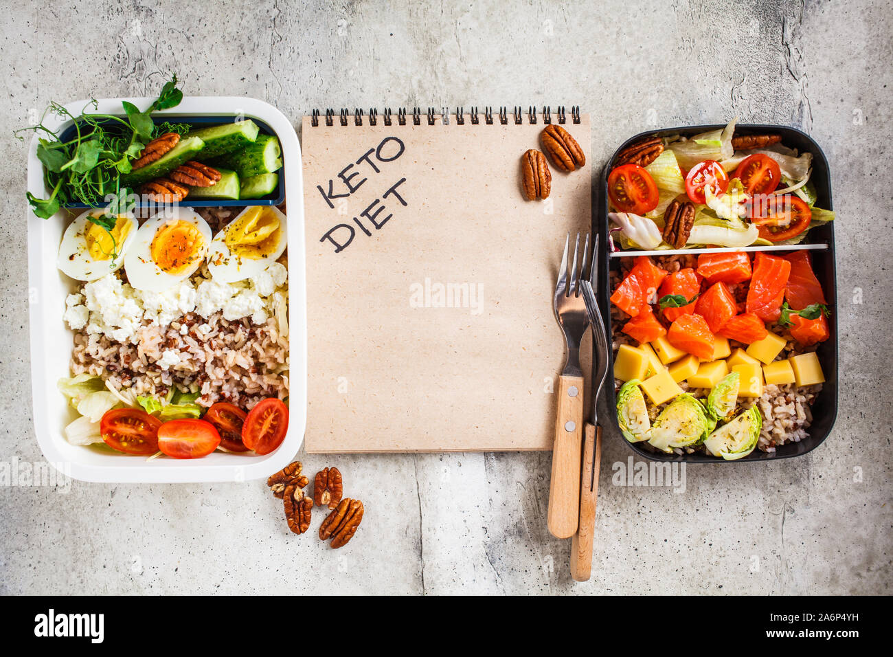 Lunch boxes with keto diet food, top view. Rice with fish, cheese, eggs ...