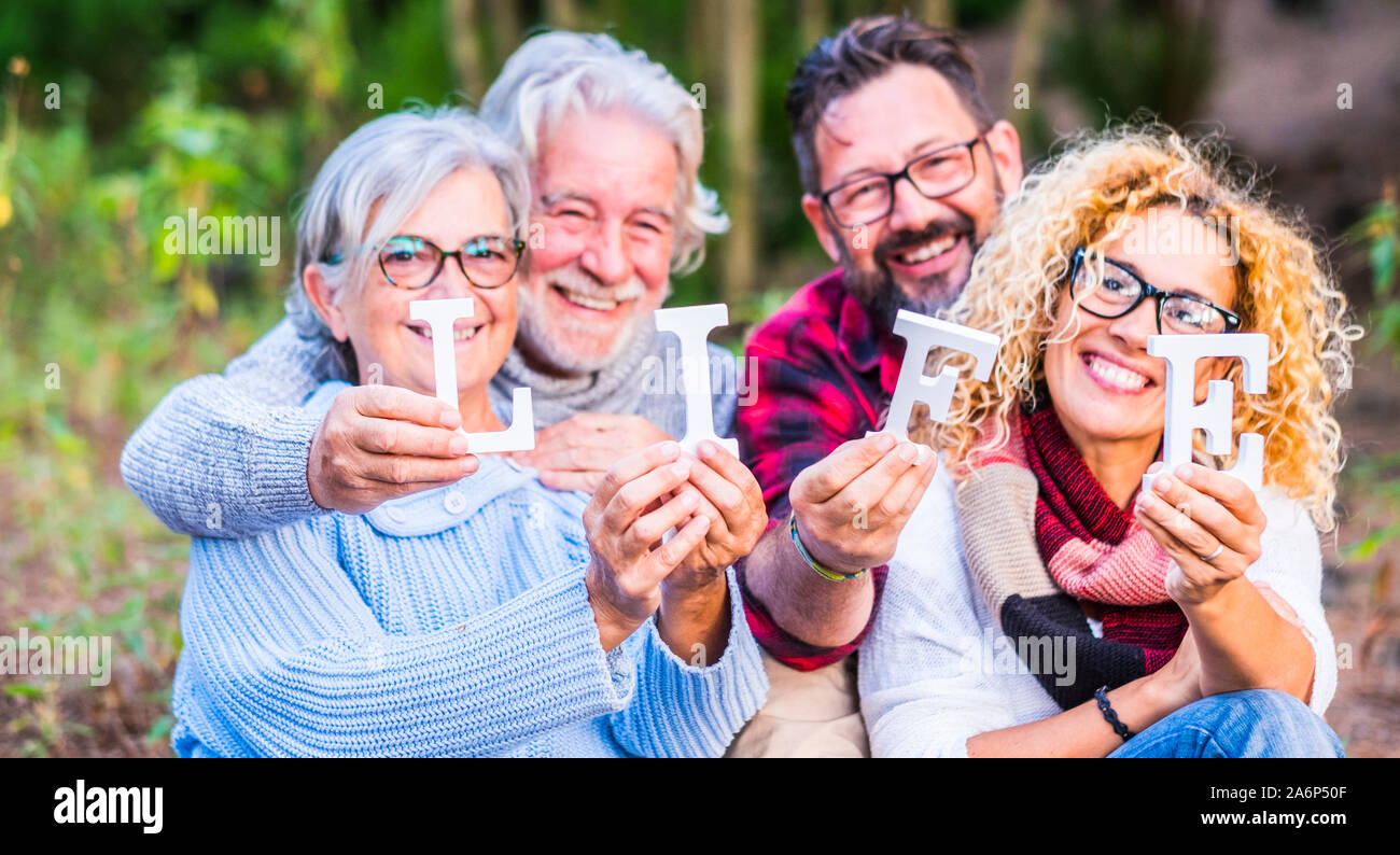 Active word hands holding people hi-res stock photography and images ...