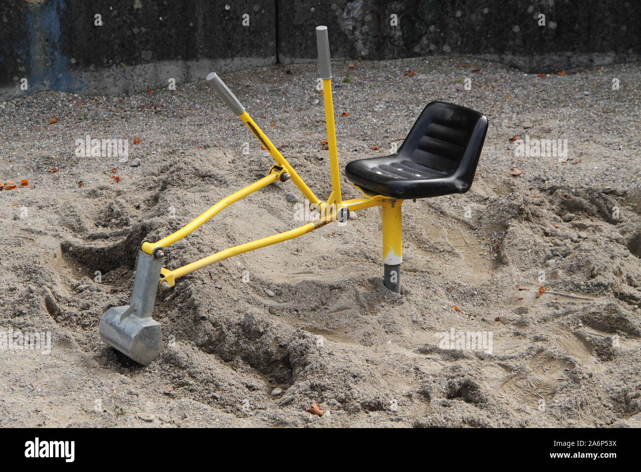 a sandbox with excavator Stock Photo - Alamy