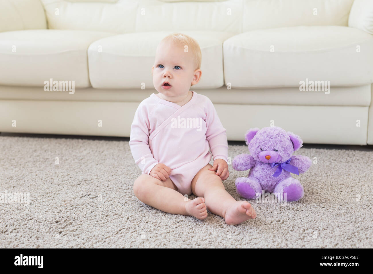 childhood, babyhood and children concept - happy little baby girl ...