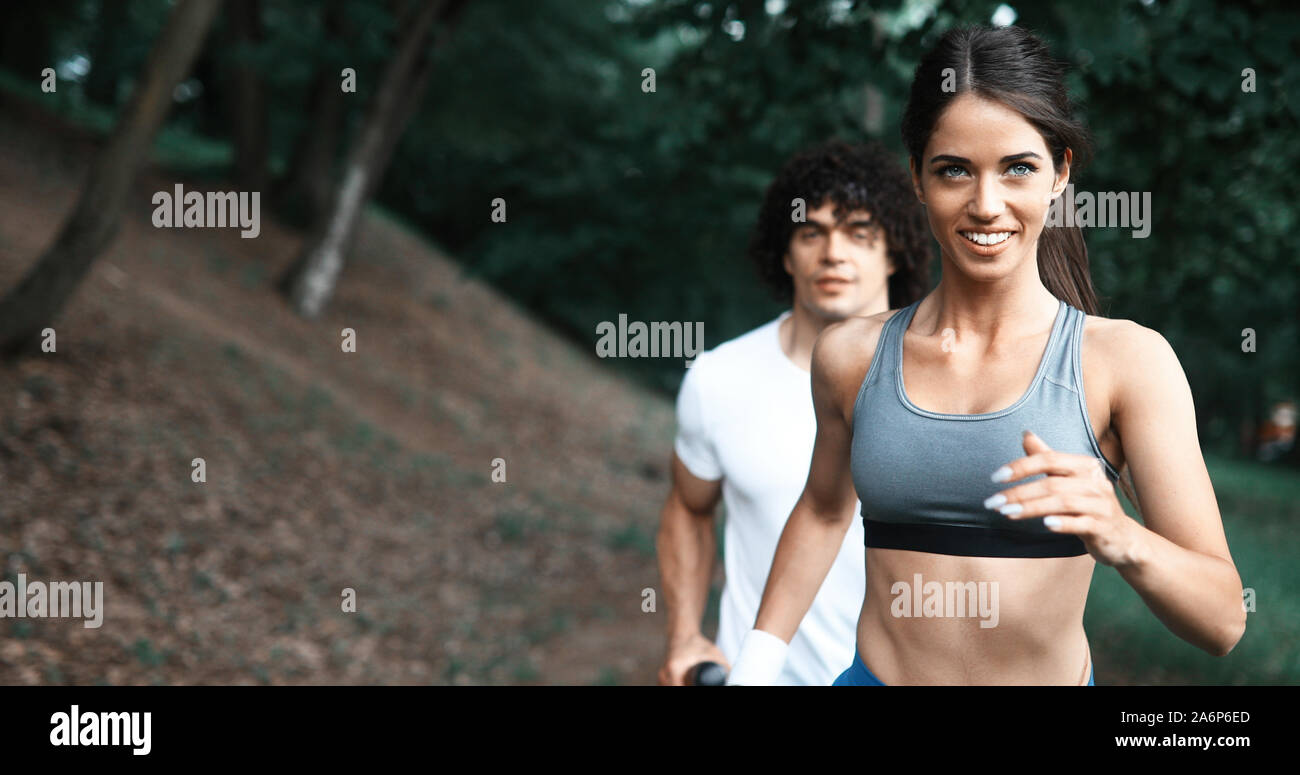Young friends running outdoors hi-res stock photography and images - Alamy