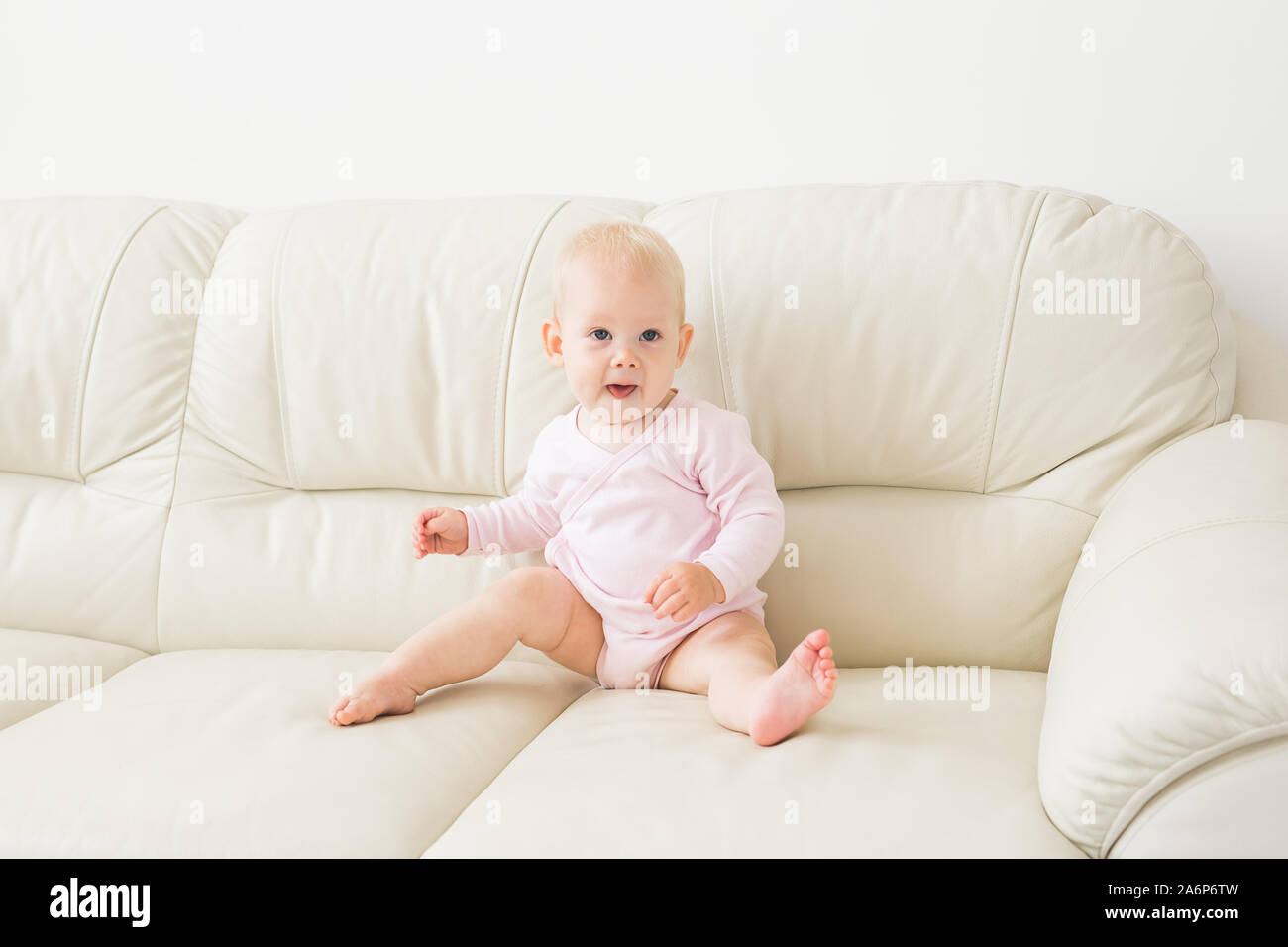 Child, childhood and kids concept - beautiful smiling baby sitting ...