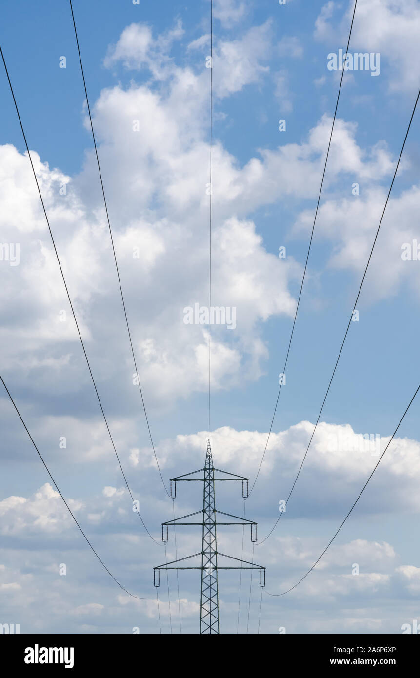 High voltage power line in a rural landscape in the countryside in ...