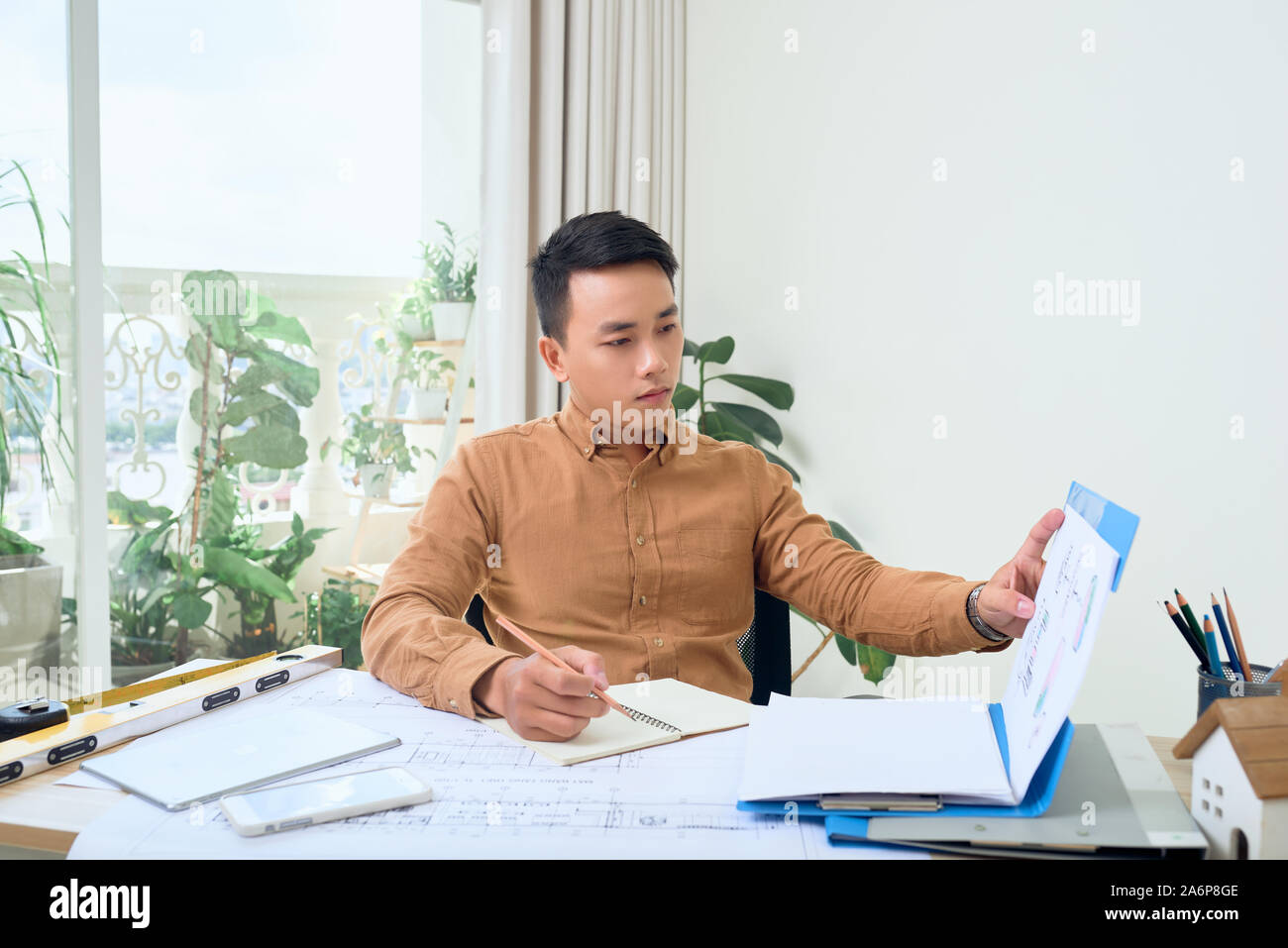 Male architect working technology hi-res stock photography and images ...