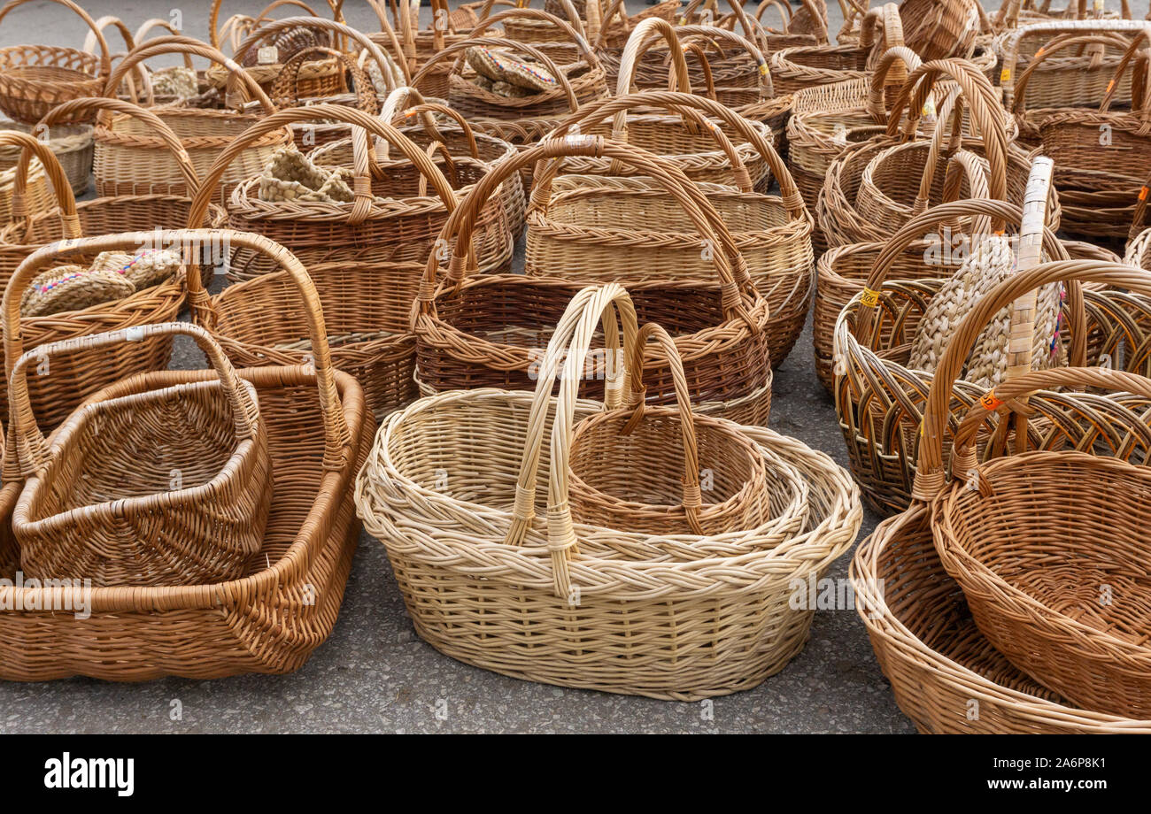 Wicker baskets made of straw. Russian craft and handmade souvenirs ...