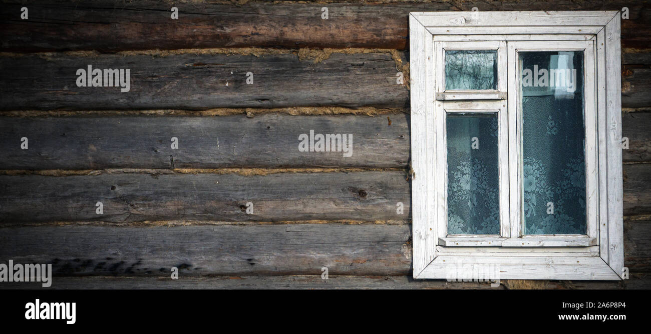 Old window in a country house. The texture of the logs. Rustic ...