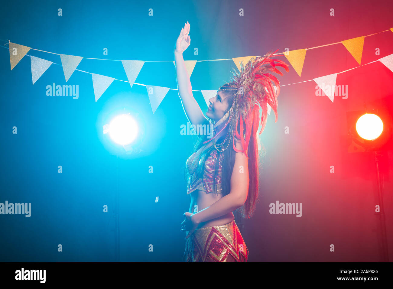 Holidays, party, dance and nightlife concept - Beautiful woman dressed ...