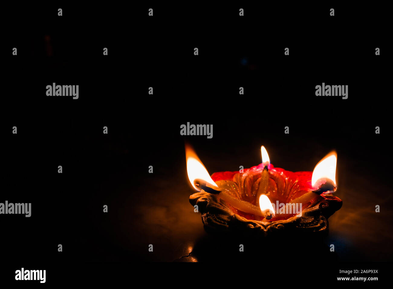 earthen oil lamp lit on the occasion of deepavali, a hindu festival of ...