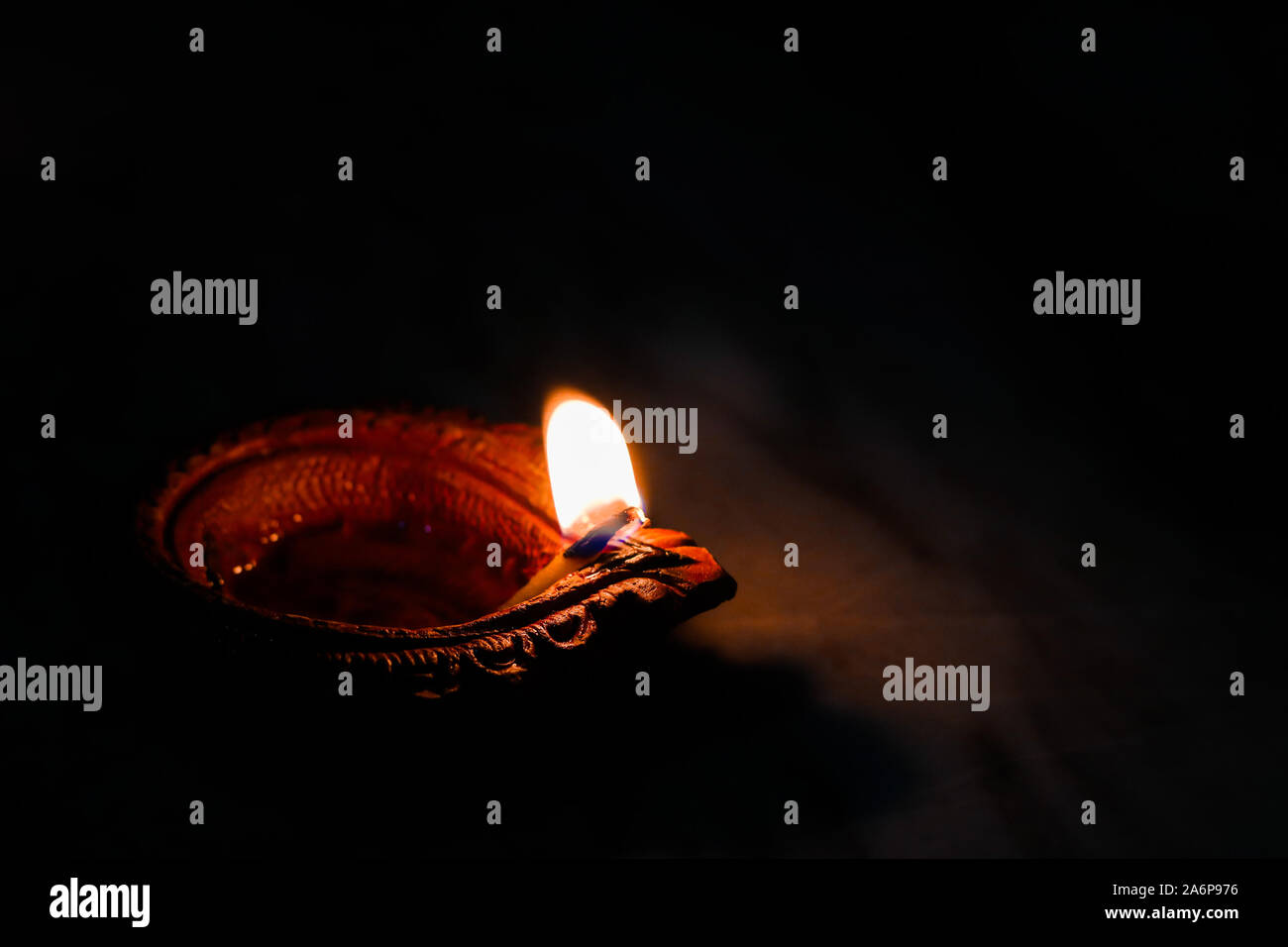 Burning earthen lamp hi-res stock photography and images - Alamy