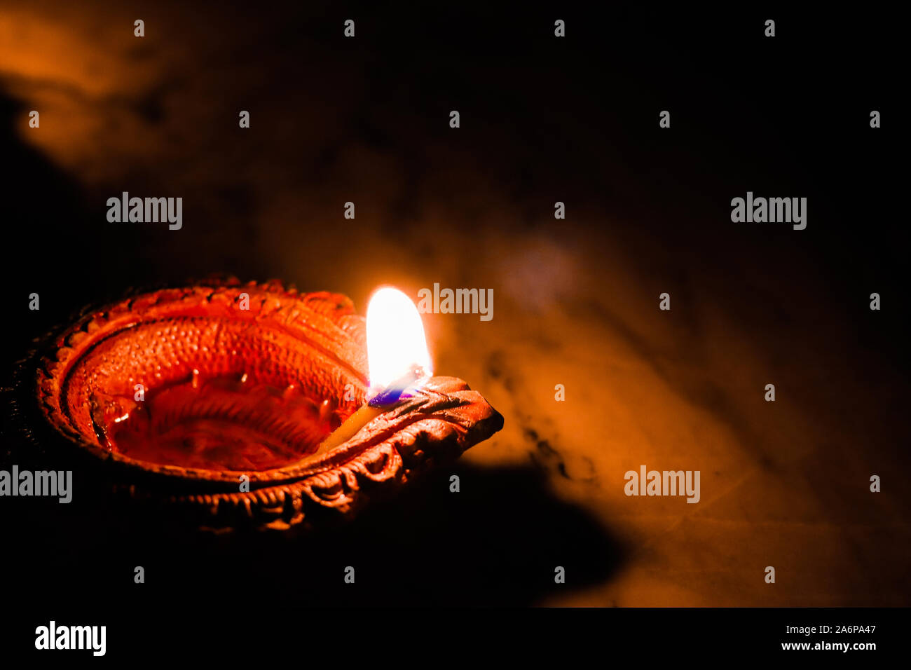 Burning earthen lamp hi-res stock photography and images - Alamy